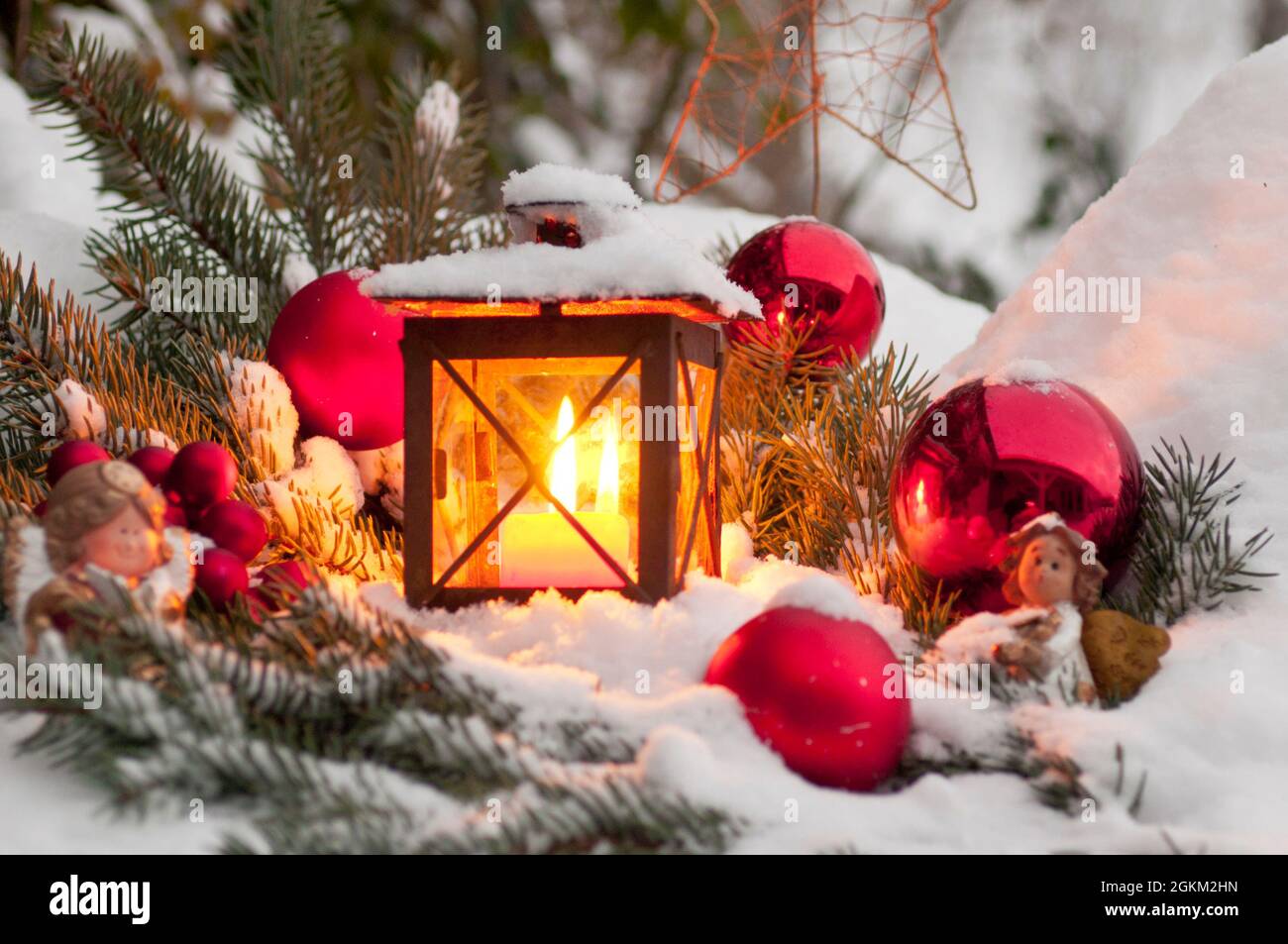 Still life: lantern with candlelight in wintry nature Stock Photo - Alamy