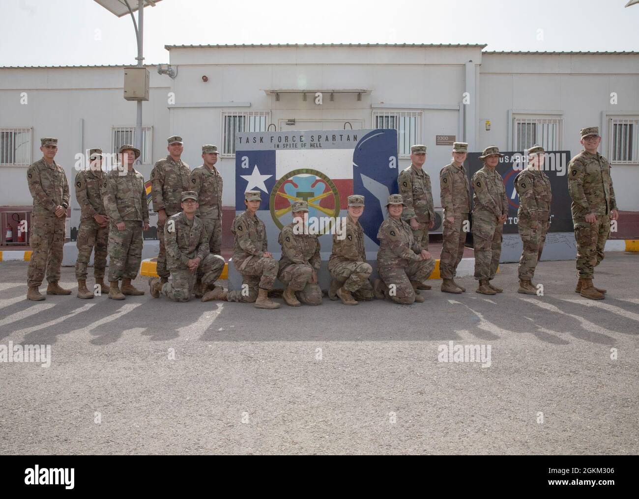 Soldiers with the 36th Infantry Division show off their newly earned ...