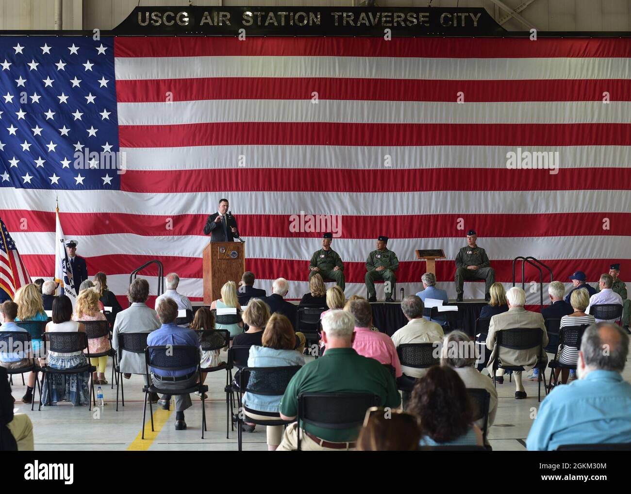 Ben Currier addresses a socially distanced gathering dedicating the ...