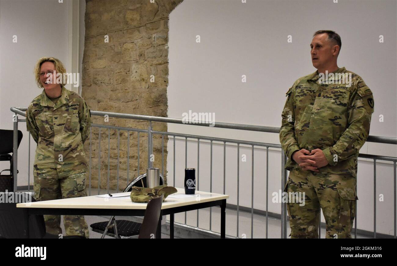 Col. Karen Hobart, garrison commander, and Command Sgt. Maj. Eric ...