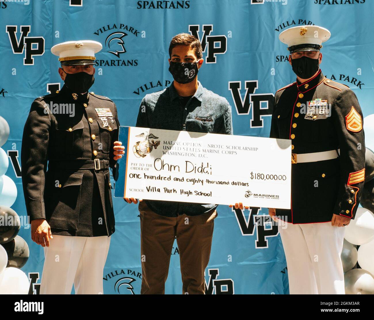 U.S. Marine Corps Capt. Isaac Orta (left), the executive officer for ...