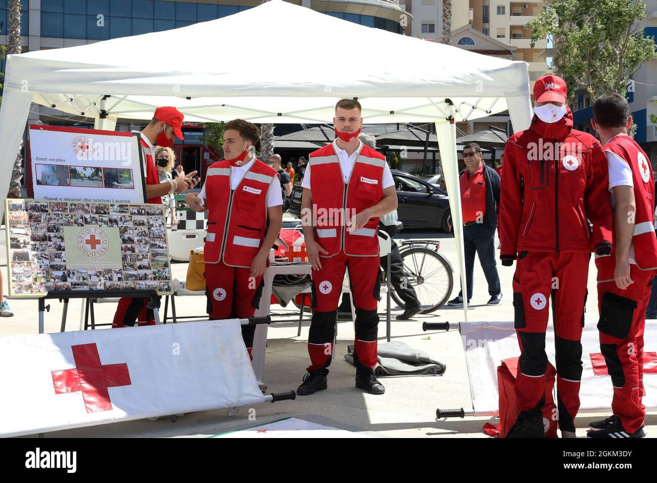 Volunteers at the Albanian Red Cross booth in Vlore educate the public ...