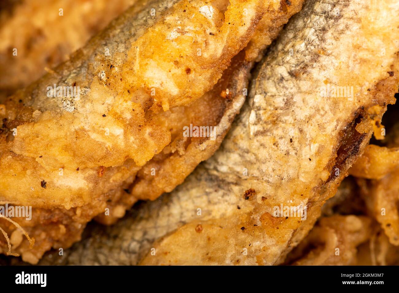 Small fried fish, surface texture, background image, close-up ...