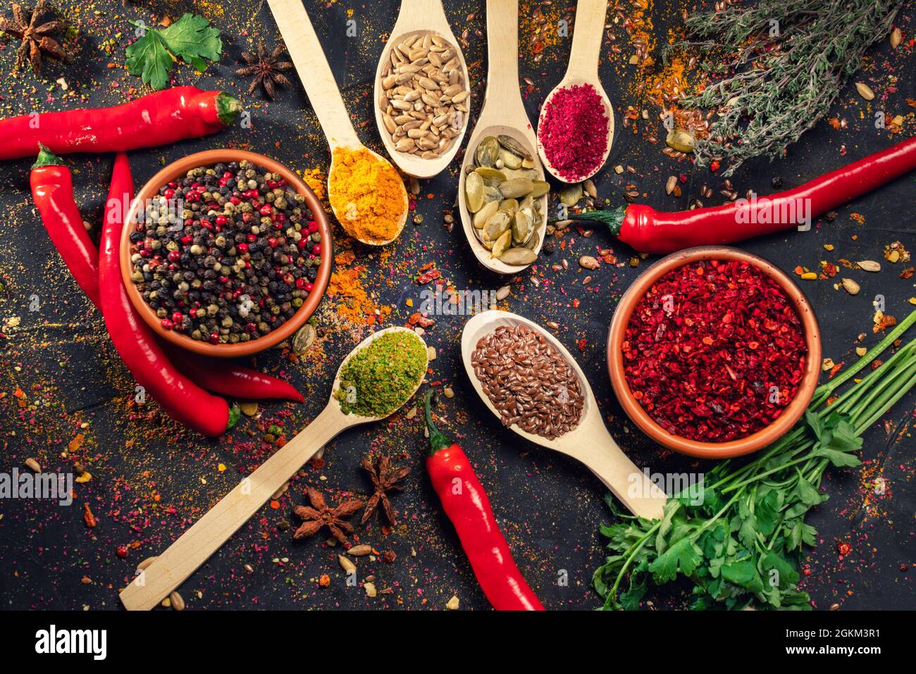 Assorted ingredient for cooking on black stone plate. Top view Stock ...