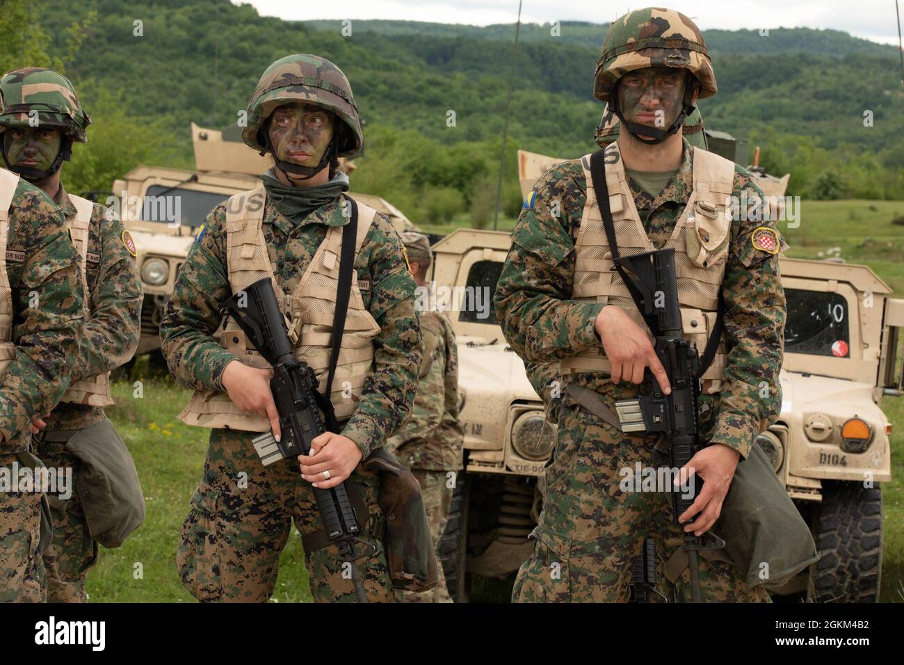 Two members of the Armed Forces of Bosnia and Herzegovina (AFBiH) stand ...