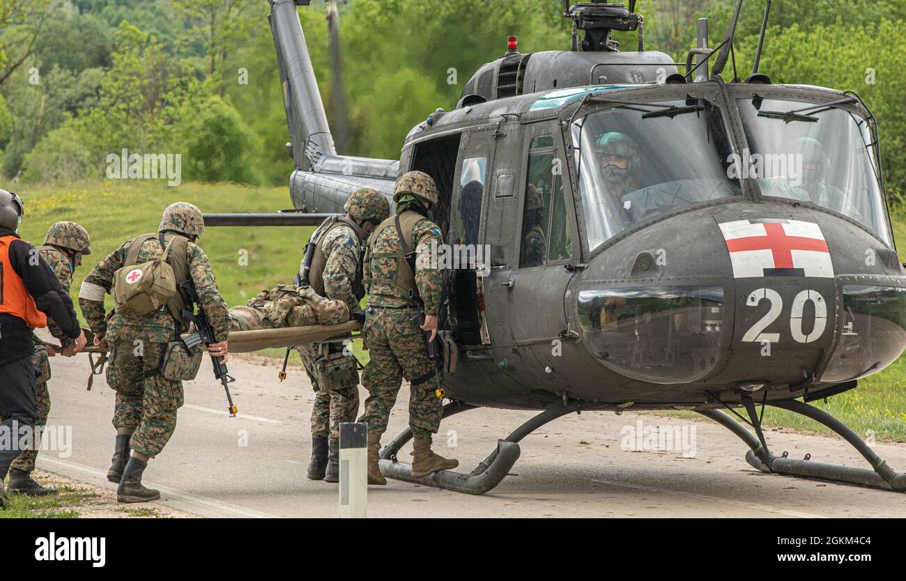 Members of the Armed Forces of Bosnia and Herzegovina (AFBiH) load a ...