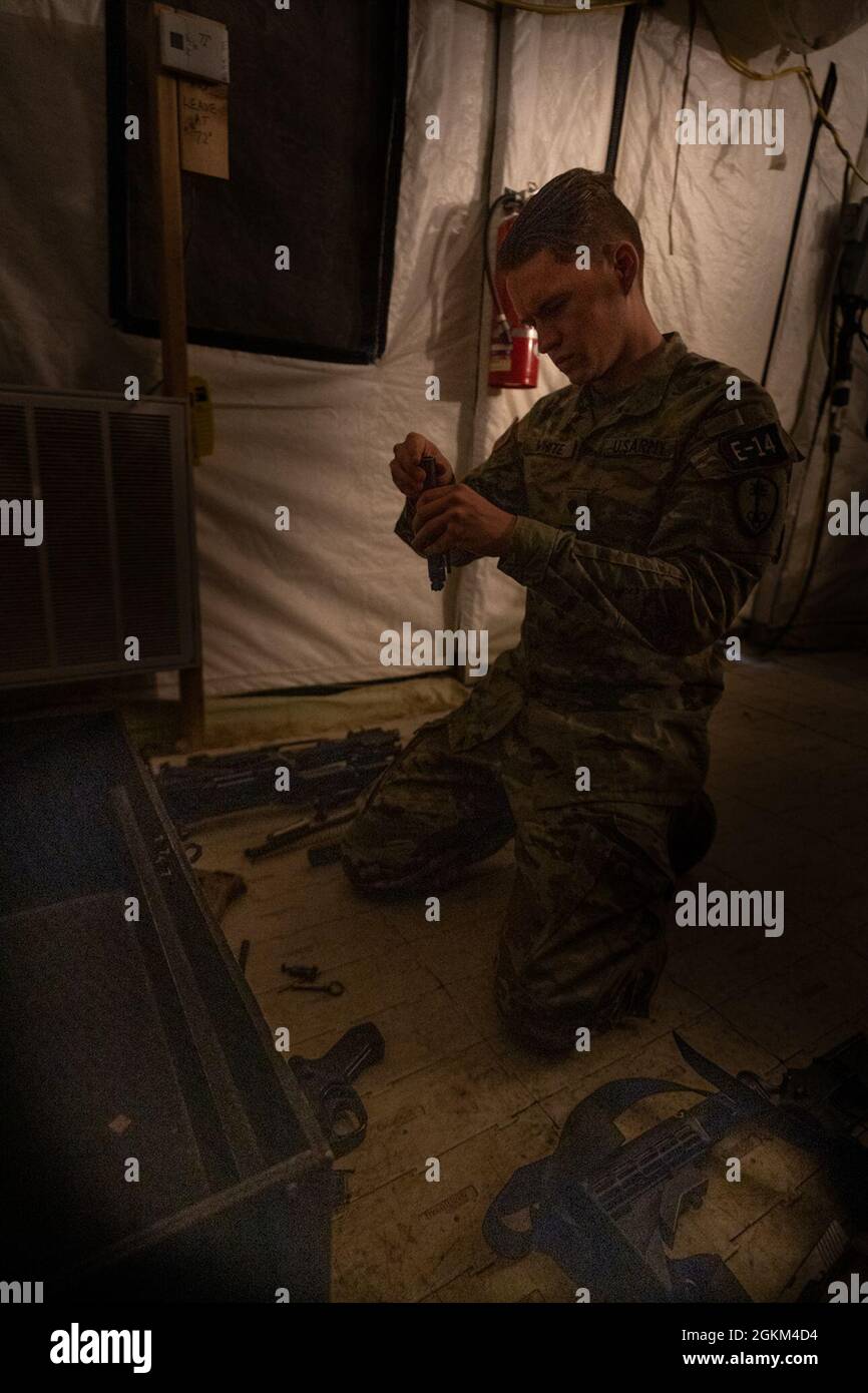 U.S. Army Reserve Soldiers assemble four different weapons systems from ...