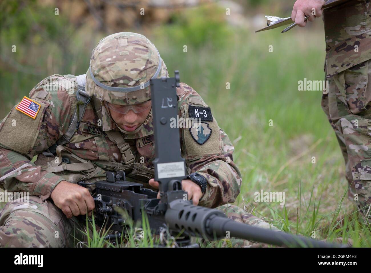U.S. Army Reserve Soldier preforms a weapon function check with the M2 ...