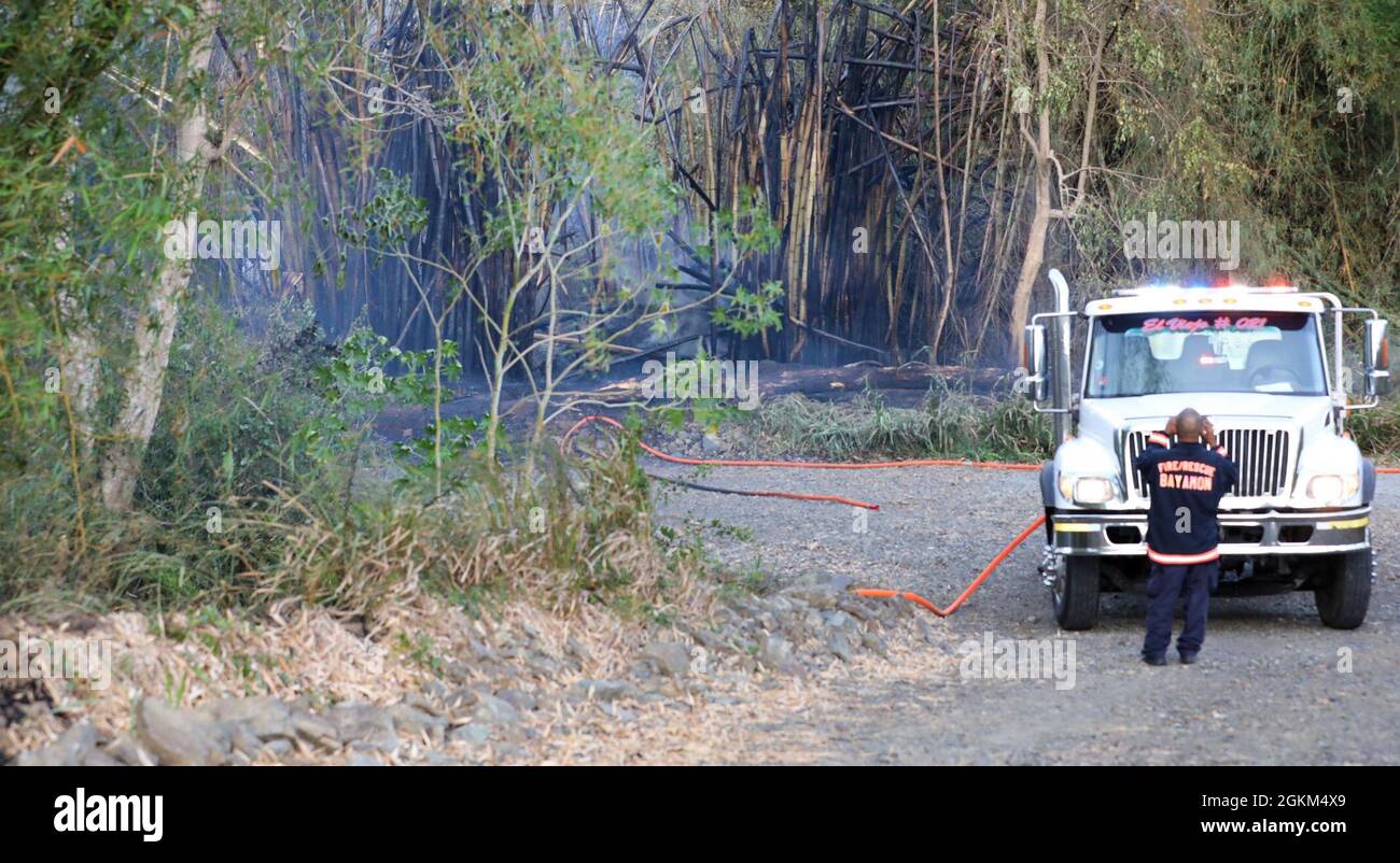 Fire departments from several municipalities fight a fire at Cayey ...