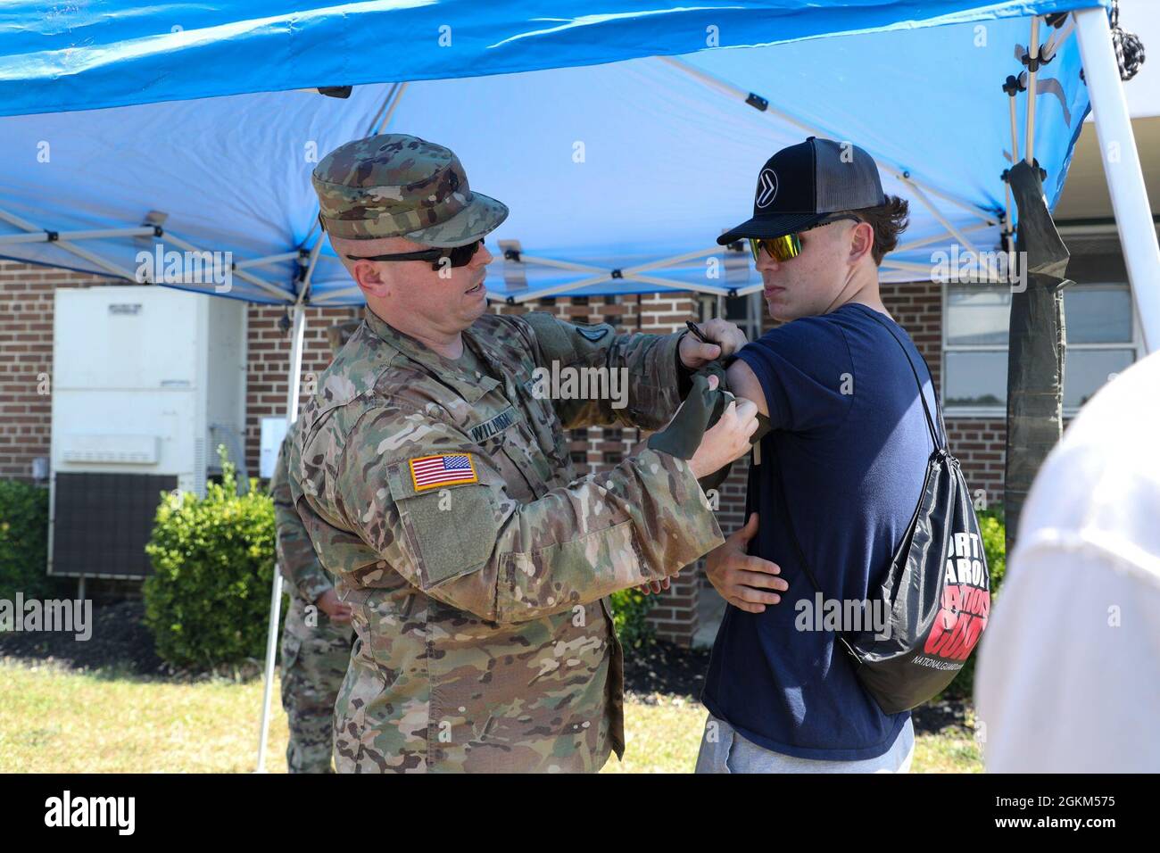 U.S. Army Staff Sgt. Dustin Wilmoth, a medic assigned to the 230th ...