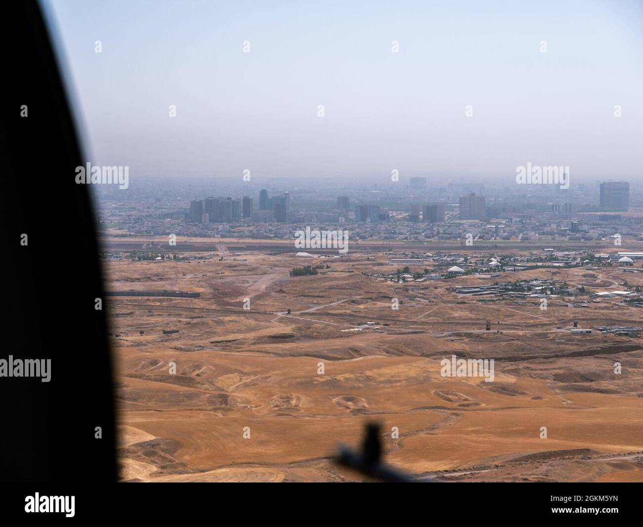 A U.S. Army Black Hawk helicopter from Task Force Phoenix flies over ...