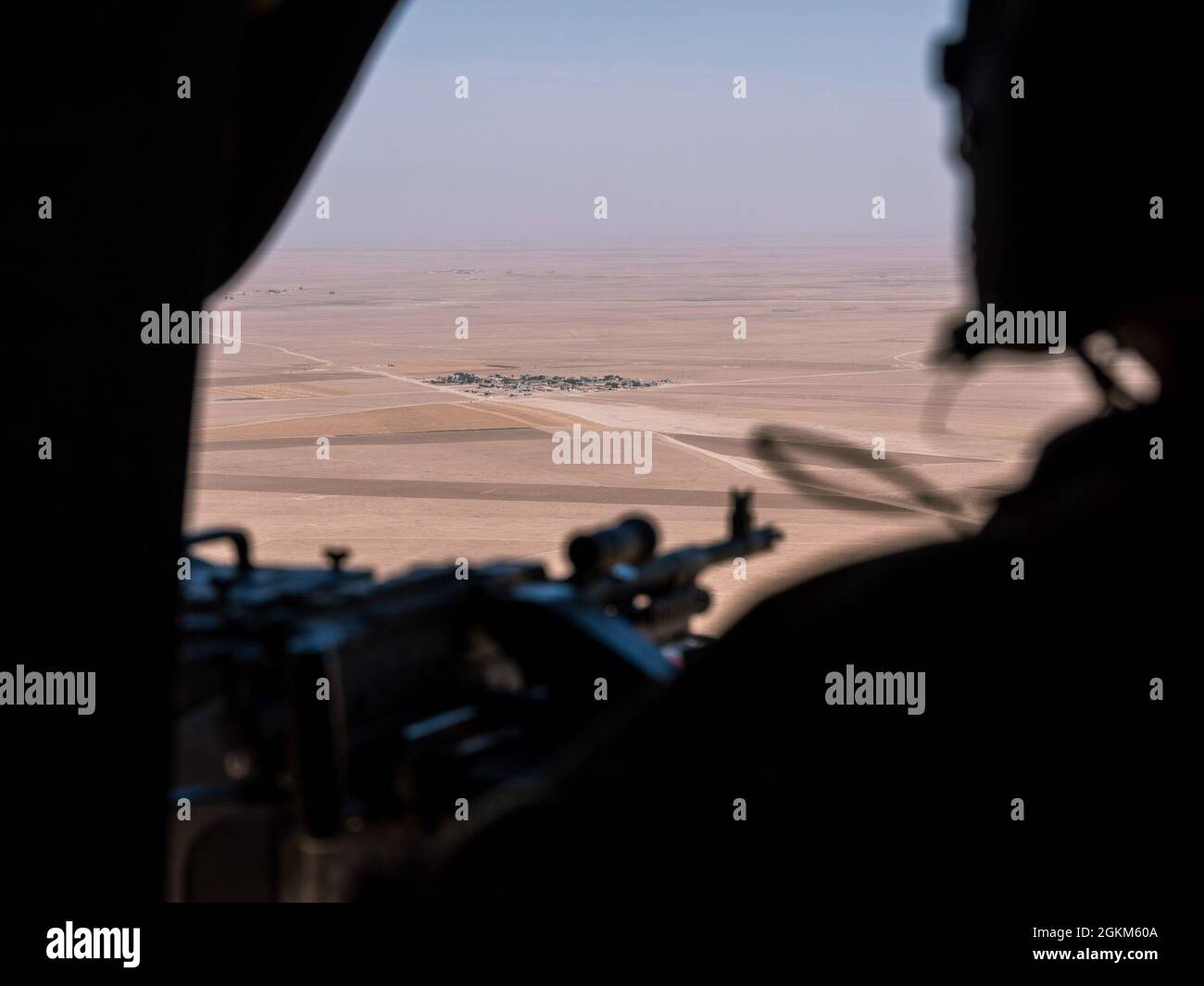 A U.S. Army Black Hawk helicopter from Task Force Phoenix flies over ...