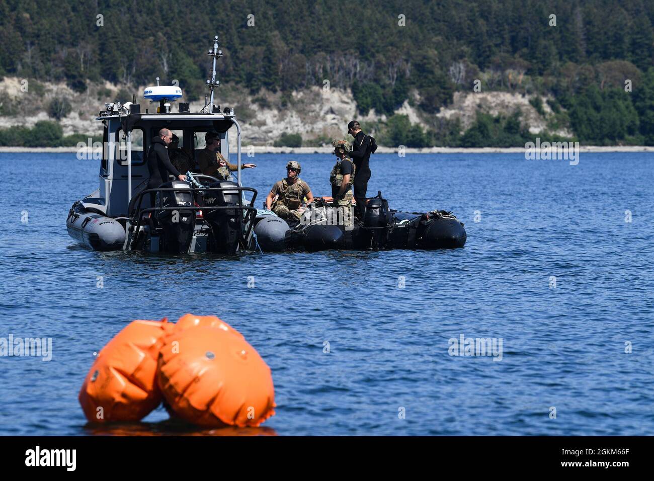 Sailors assigned to Explosive Ordnance Disposal Mobile Unit (EODMU) 1 ...