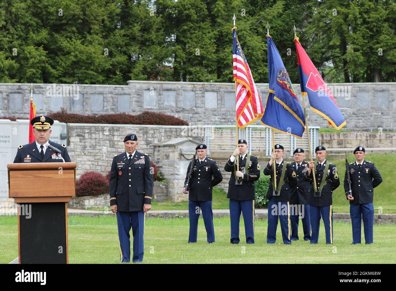 Maj. Gen. Mark McCormack (at podium), commander of the 28th Infantry ...