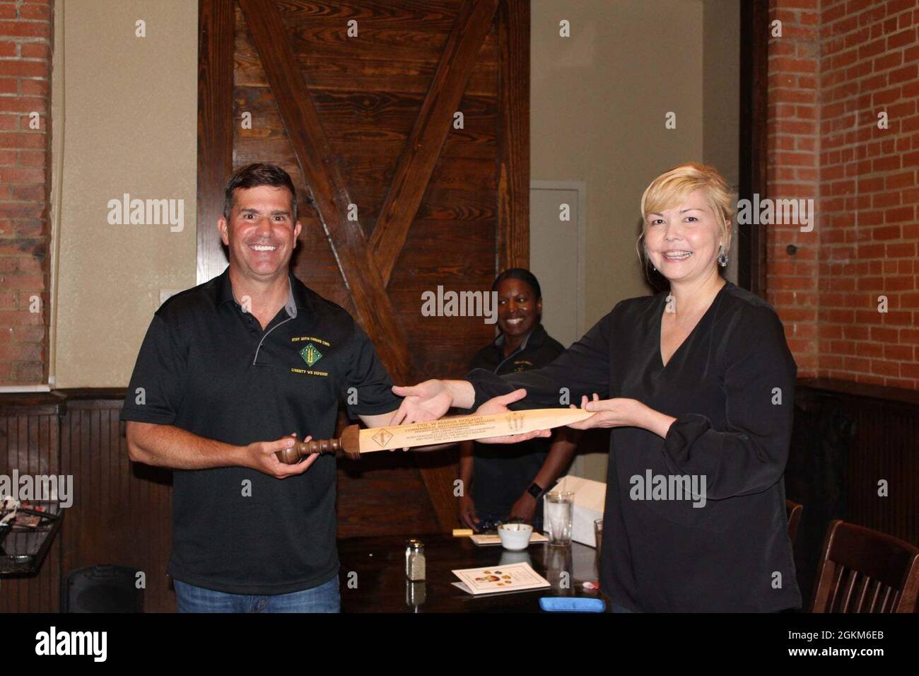Col. W. Bochat, outgoing 48th Chemical Brigade commander (right) is all ...