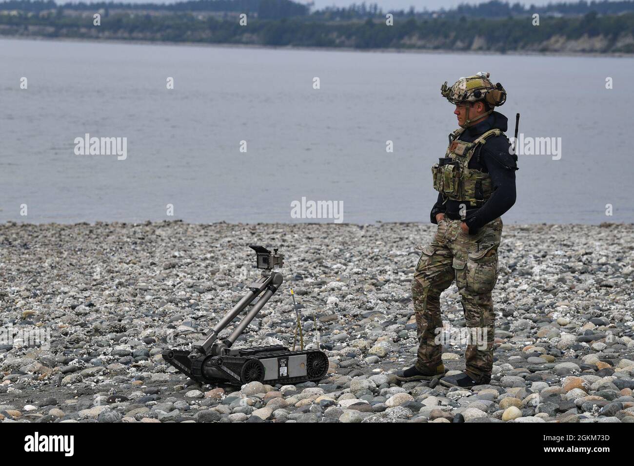 A Sailor assigned to Explosive Ordnance Disposal Mobile Unit (EODMU) 1 ...
