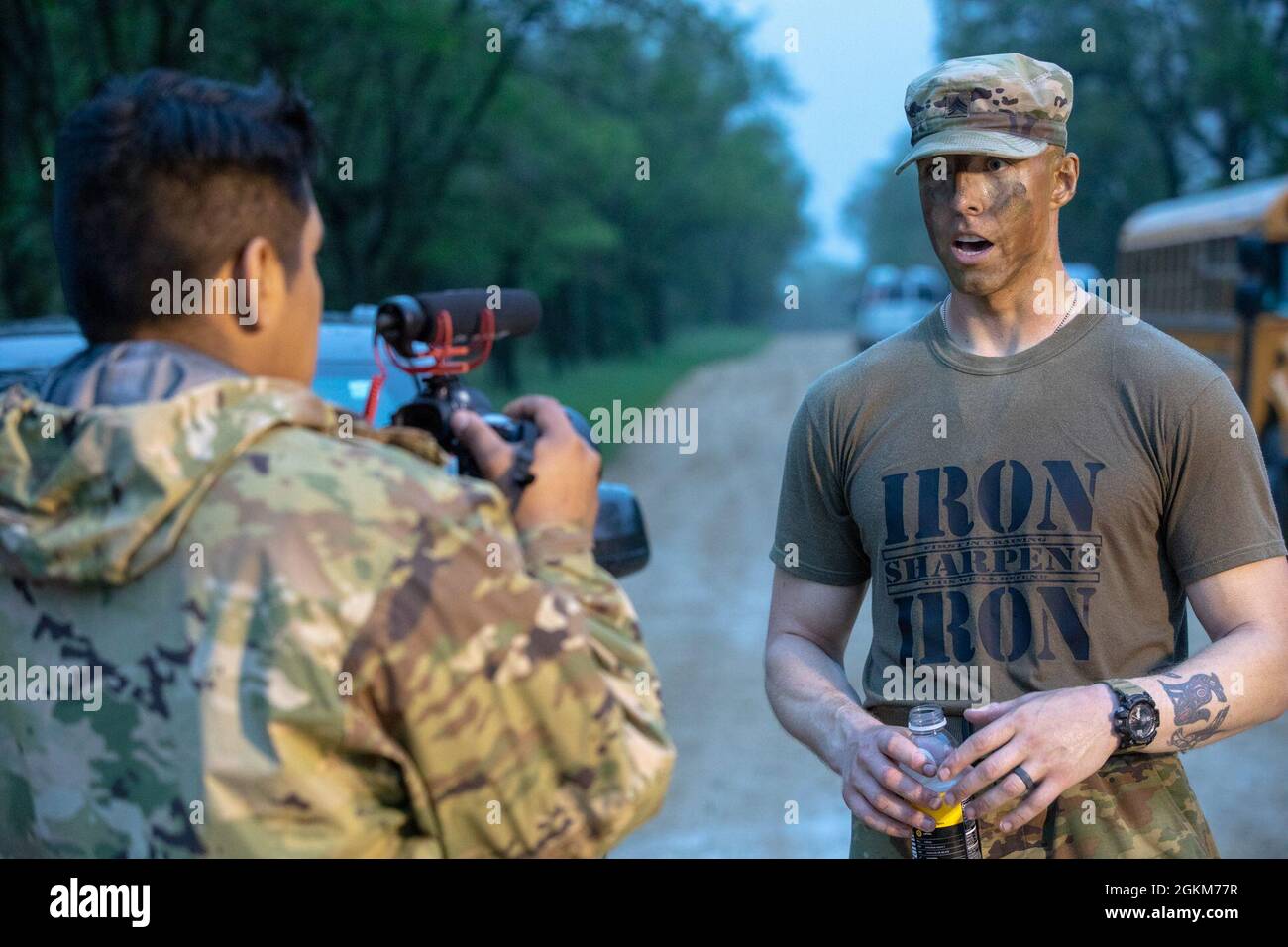 A U.S. Army Reserve Soldier conducts interview during the Ruck March ...