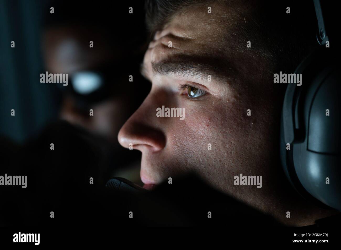 U.S. Air Force Airman 1st Class Matthew Zielinski, an in-flight ...