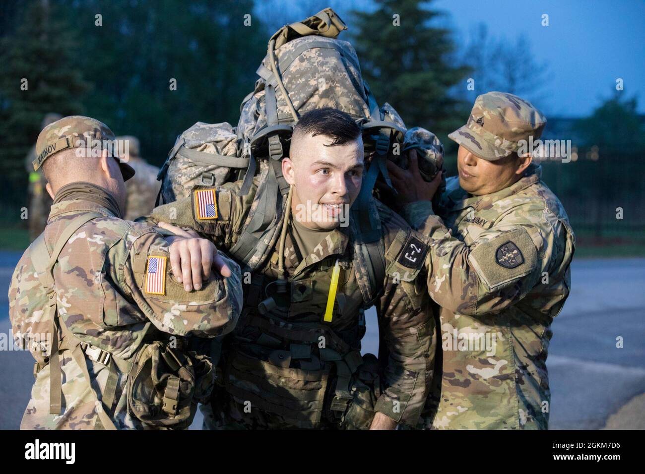 Best Warrior/ Best Squad Cadre assist Sgt. Logan Duvall, a U.S. Army ...