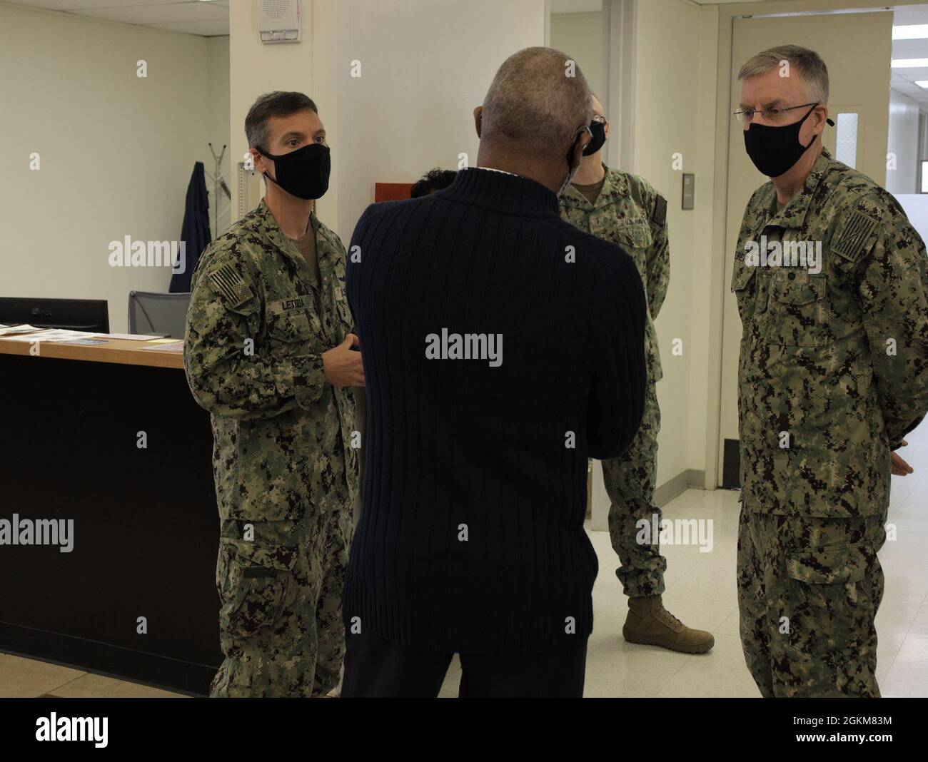 Rear Adm. Tim Weber, Naval Medical Forces Pacific commander, talks with ...