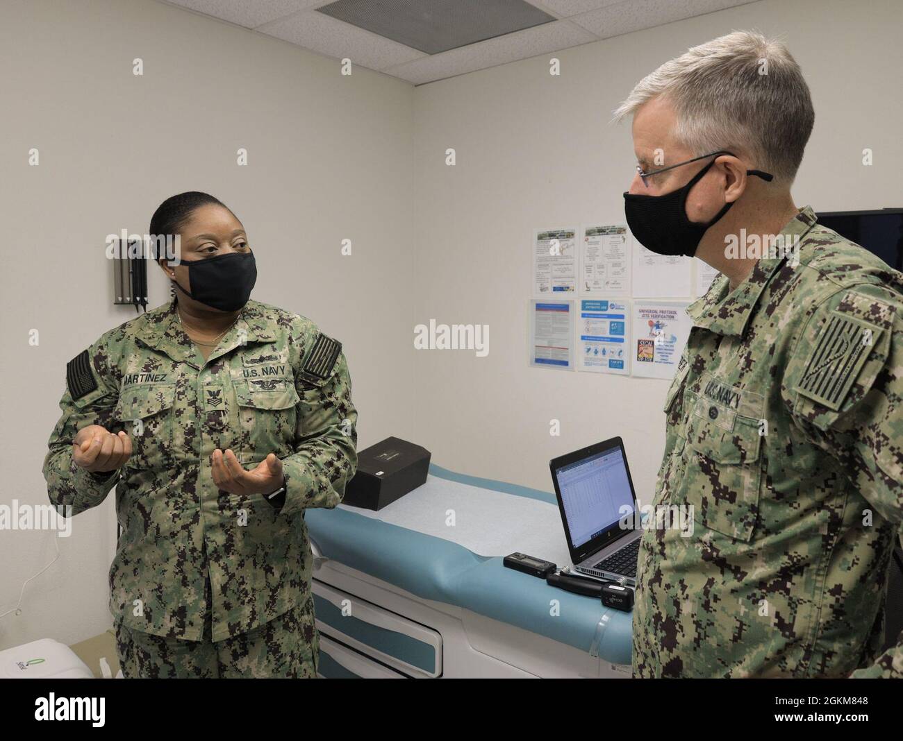 Rear Adm. Tim Weber, Naval Medical Forces Pacific commander, talks with ...
