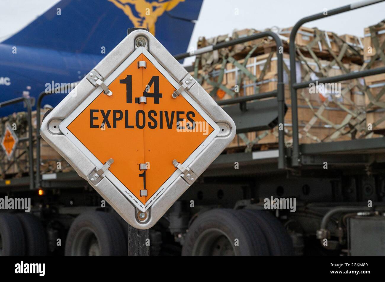 An explosives sign marks the cordon around an aircraft in support of a ...