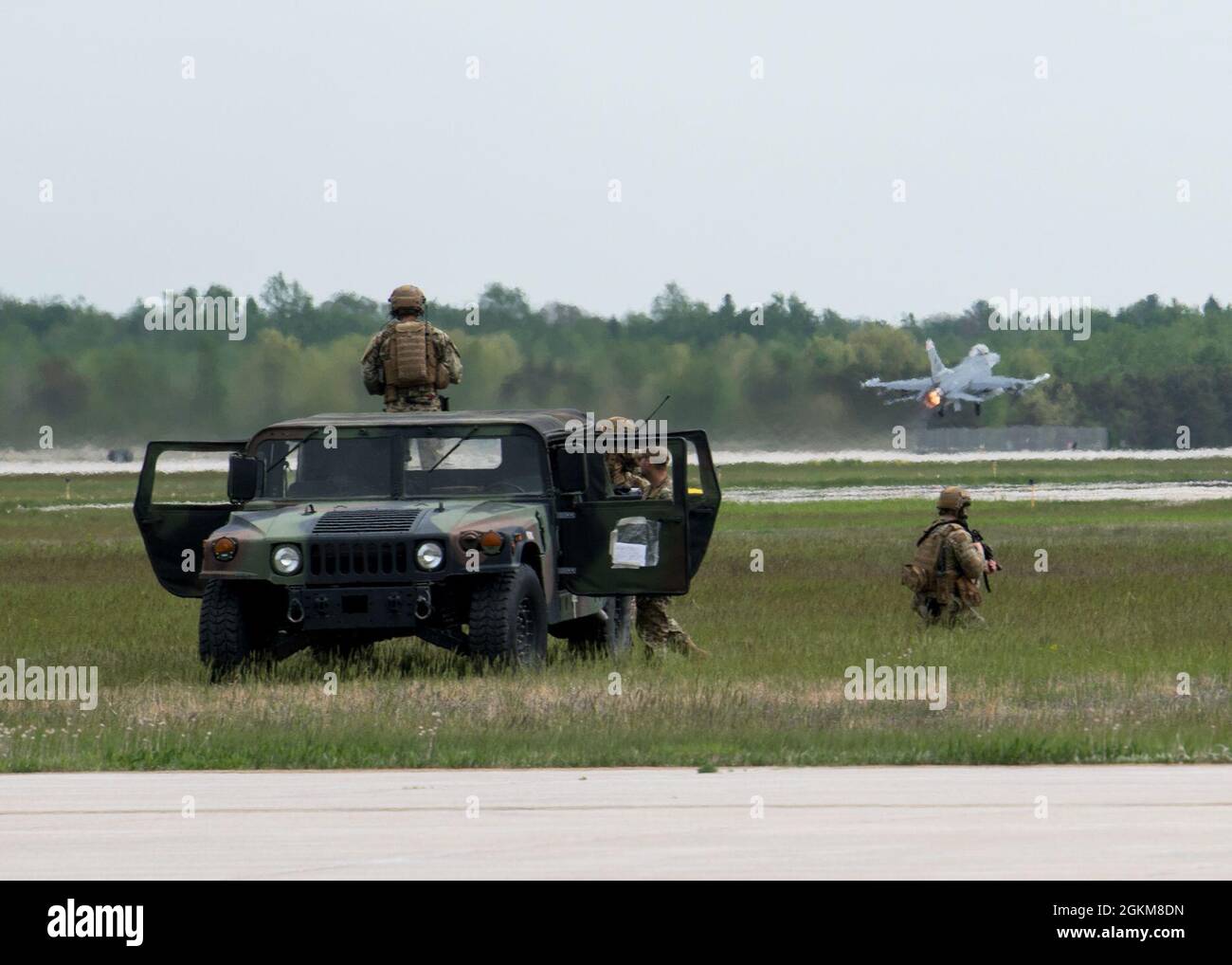 U.S. Air Force contingency response Airmen secure the flight line ...