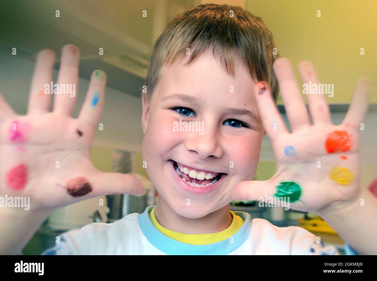 Handsome boy shows his painted hands and smiles Stock Photo - Alamy Handsome boy shows his painted hands and smiles Stock Photo - Alamy