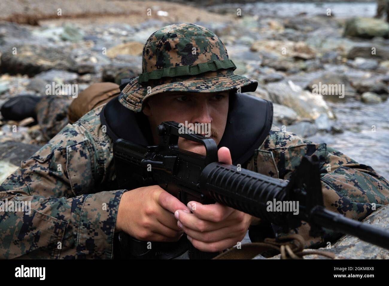 U.S. Marine Corps Cpl. John Perry, a rifleman with 3d Battalion, 3d ...
