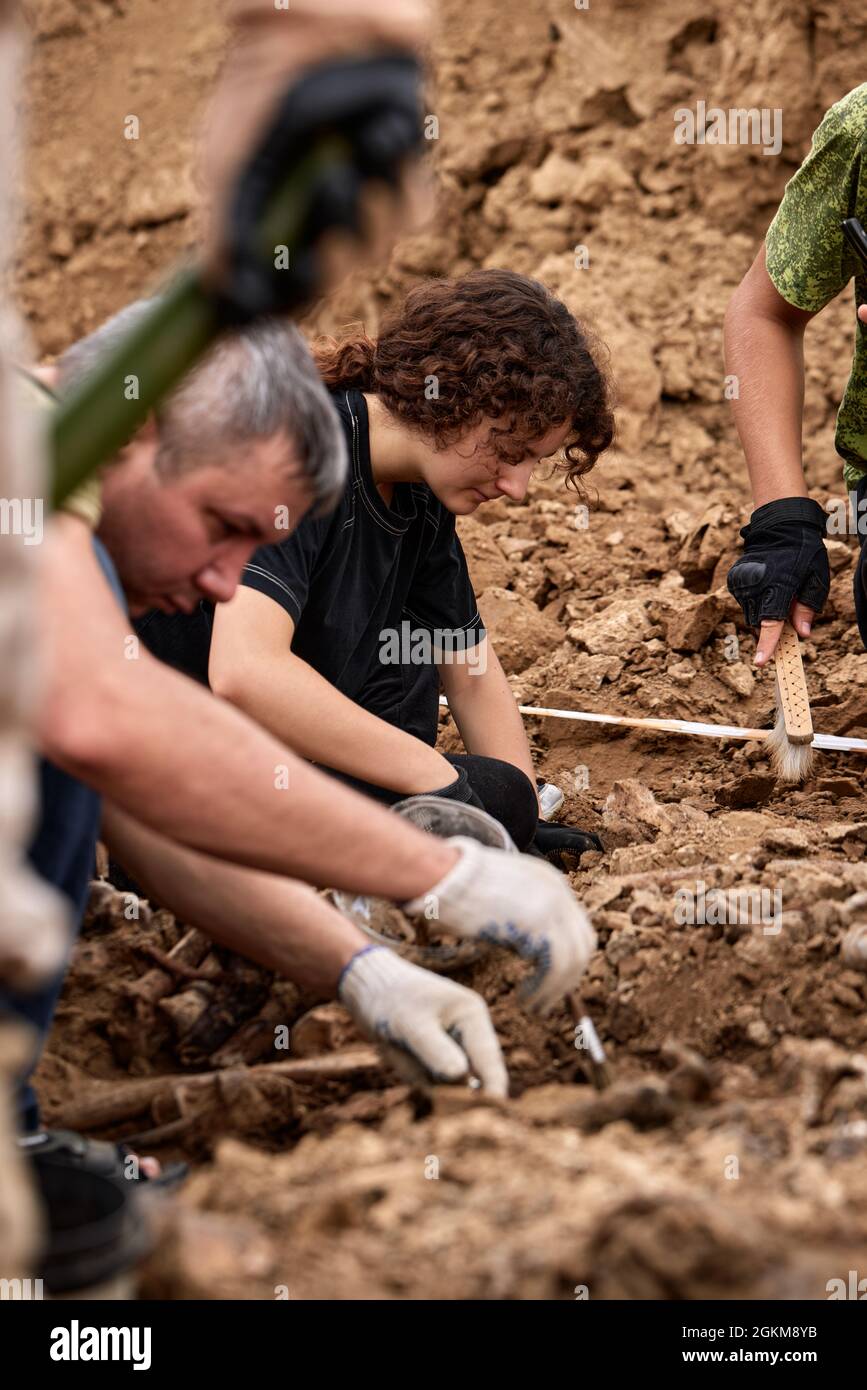 Excavations at the site of a war crime. Site of a mass shooting of ...