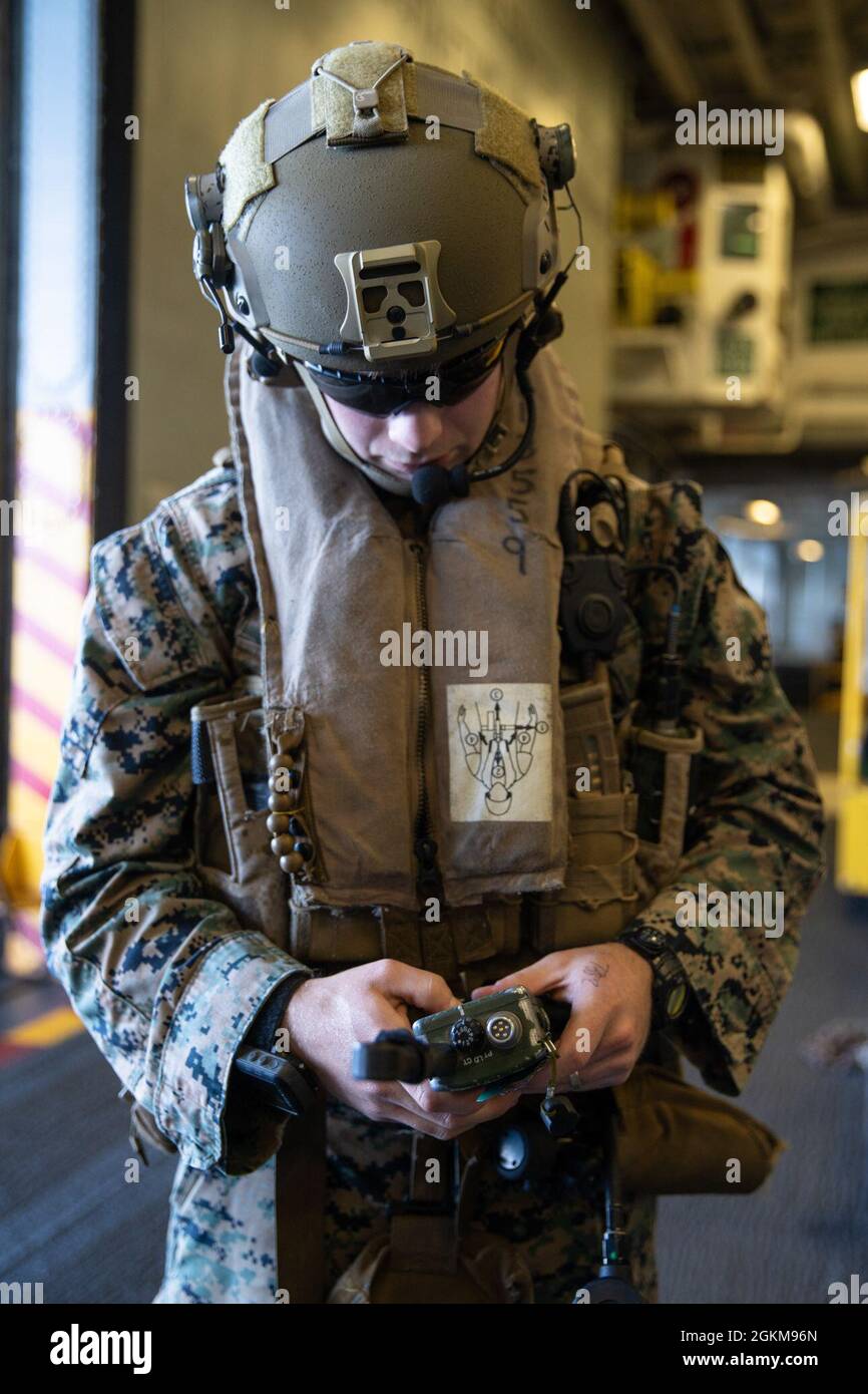 PACIFIC OCEAN (May 24, 2021) U.S. Marine Corps Sgt. Sheldon Adams, a ...