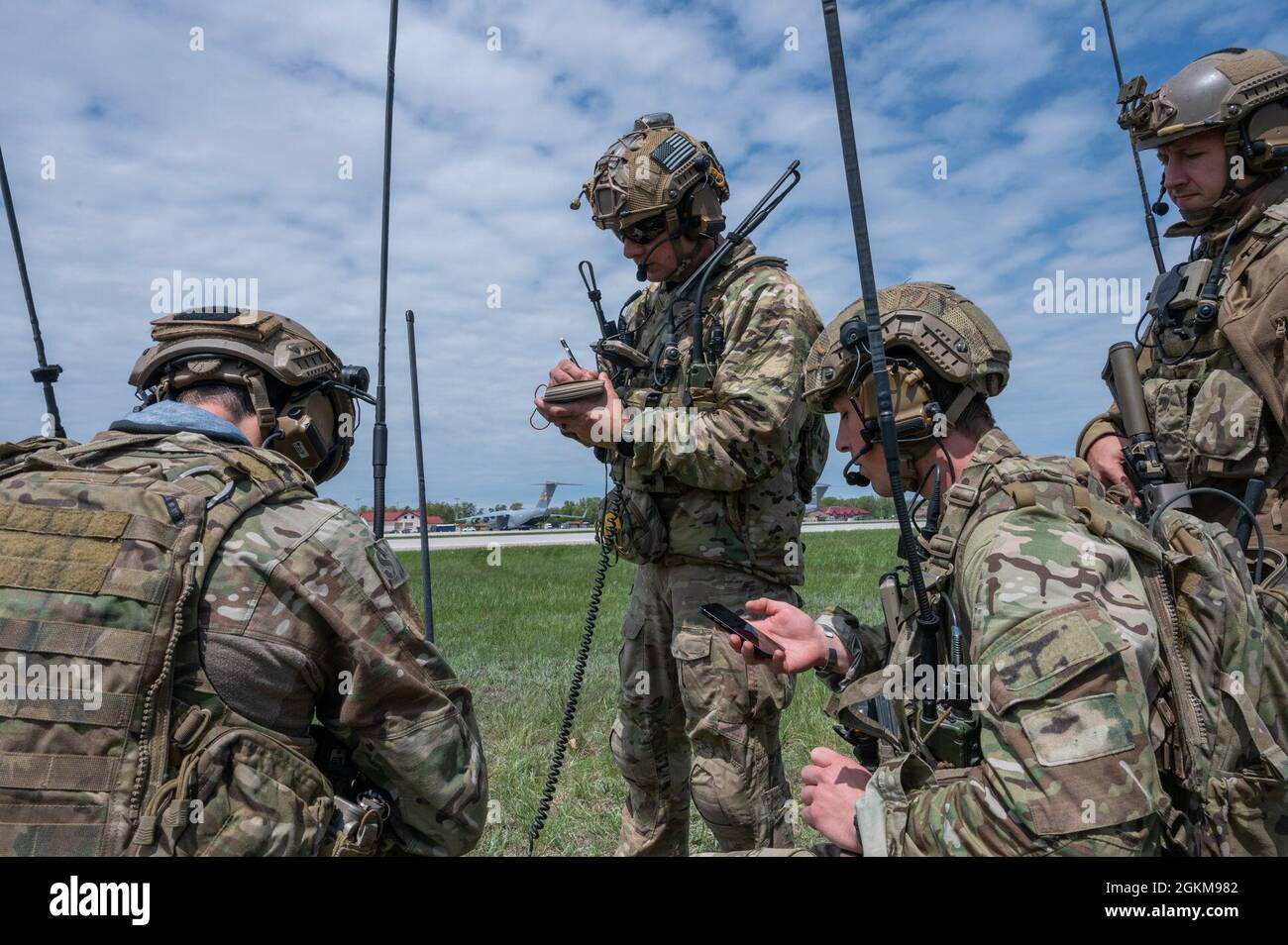 U.S. Air Force Special Tactics operators communicate with aircraft ...