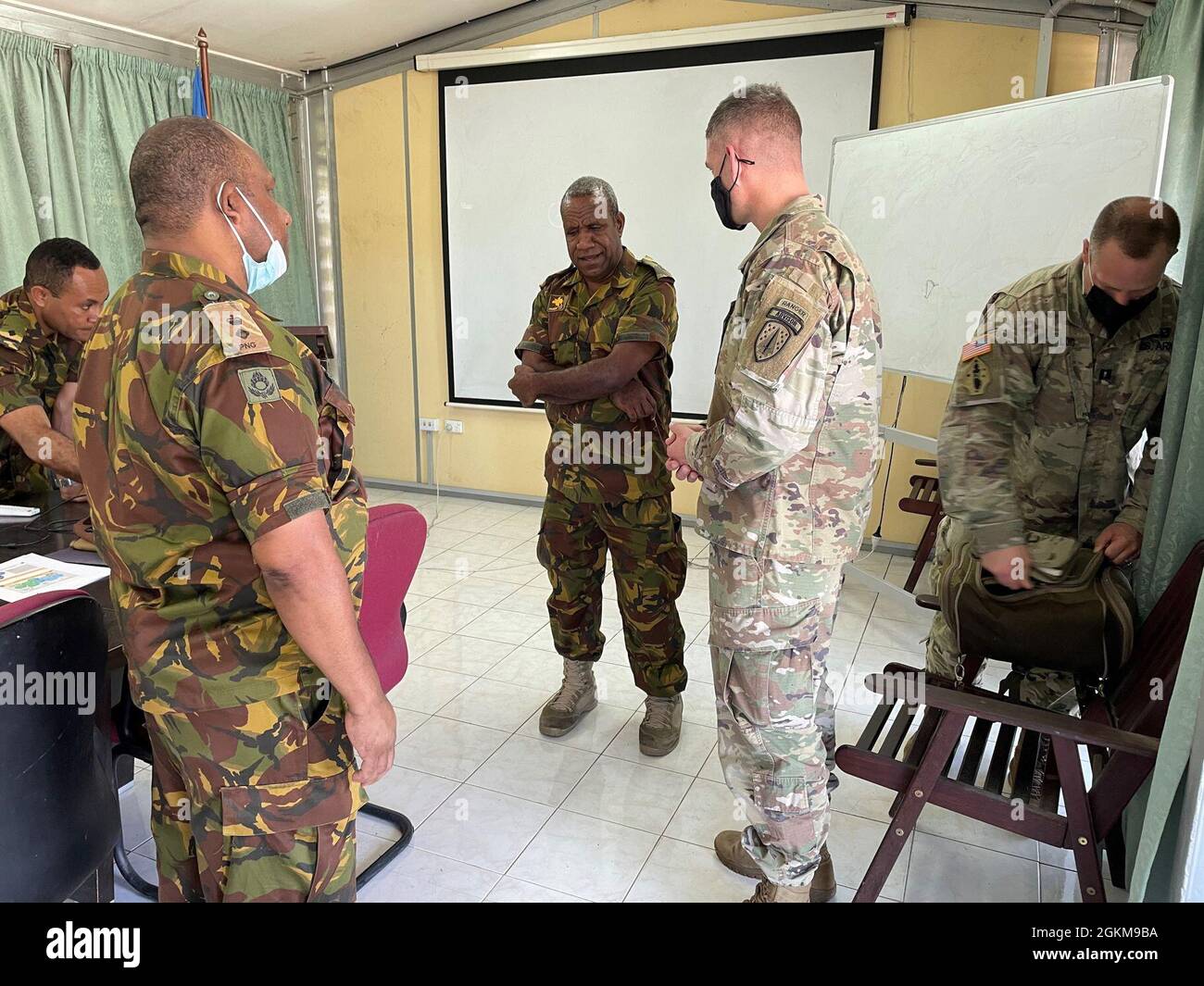 Lt. Col. Jeremiah O'Connor receives a briefing from a contingent of ...