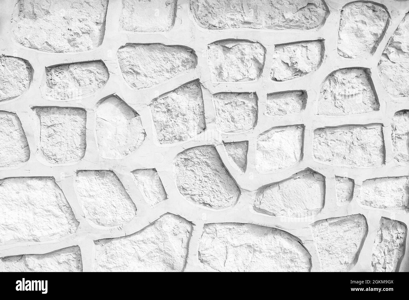 Background of white broken stone wall texture Stock Photo - Alamy