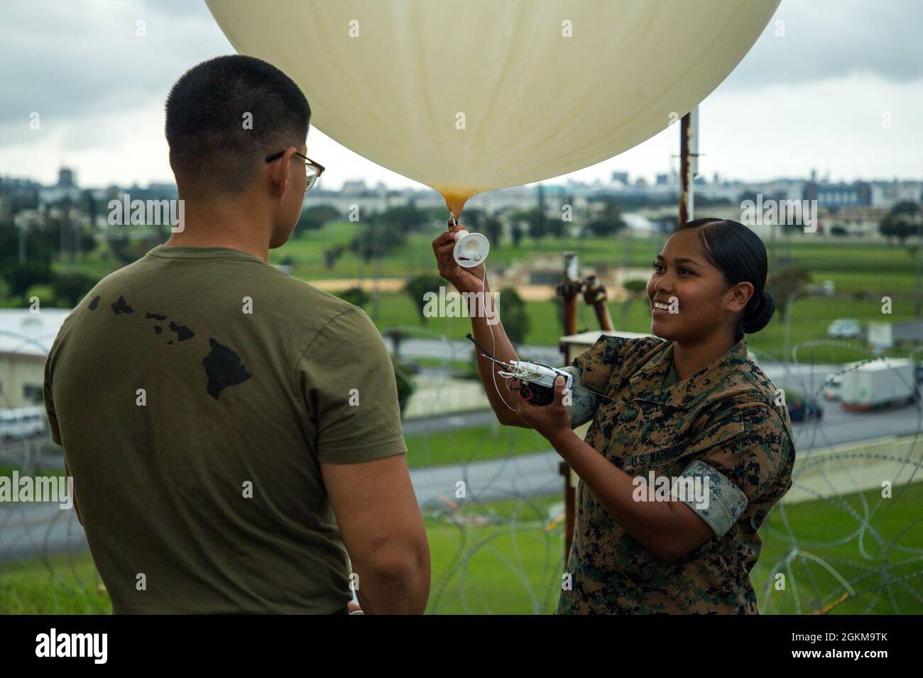 U.S. Marine Corps Cpl. Alicia Lucio, a Meteorological and Oceanographic ...