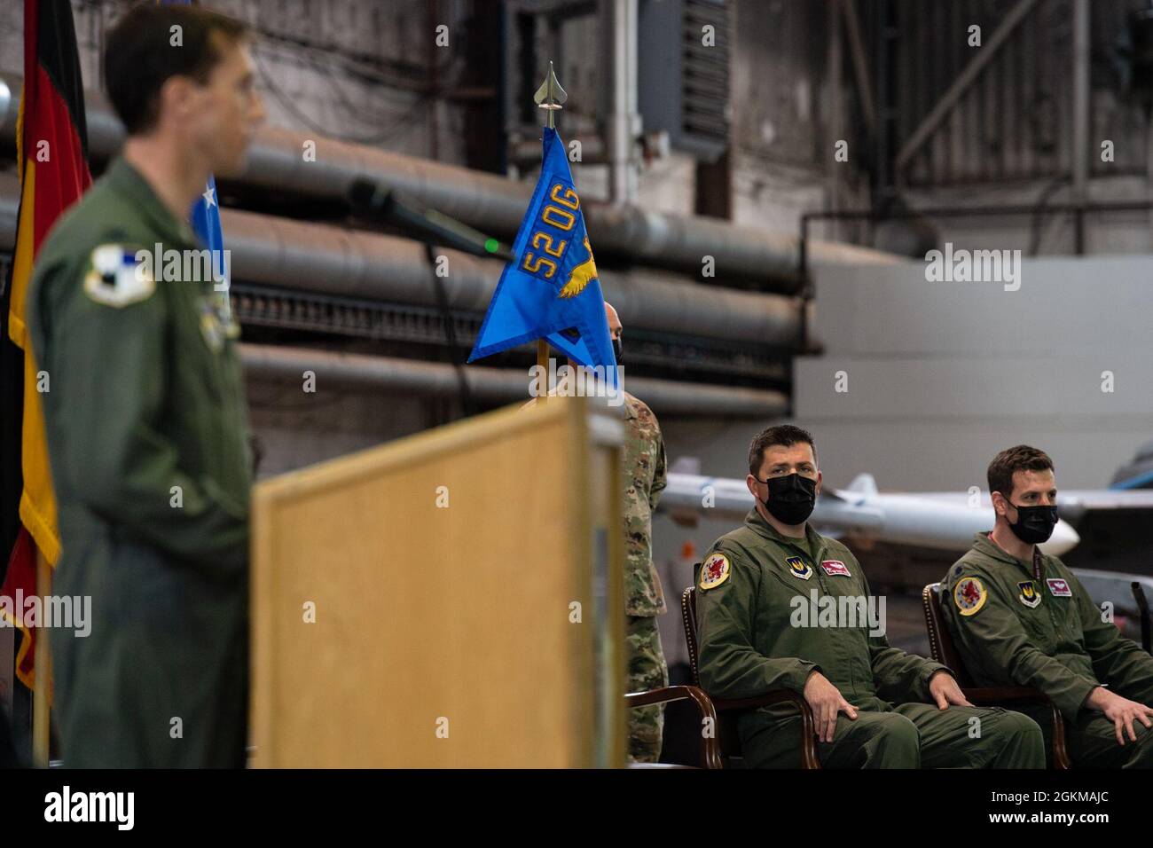 U.S. Air Force Lt. Col. Matthew Hoyt (center) and Lt. Col. John Powers ...