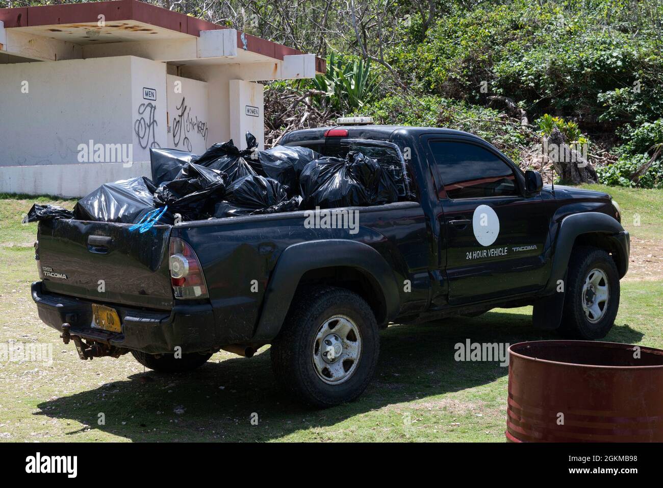 Post-cleanup trash is loaded up to be taken away from Taga’chang Beach ...