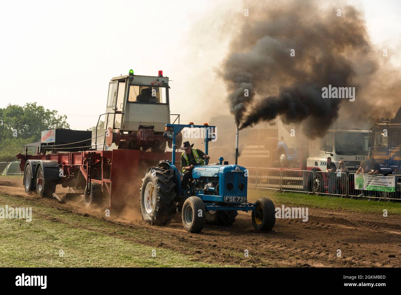 Tractor pulling contest showing huge exhaust fumes at a steam rally in ...