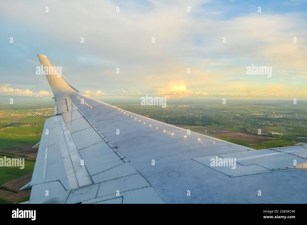 Plane wing in the sky Stock Photo - Alamy