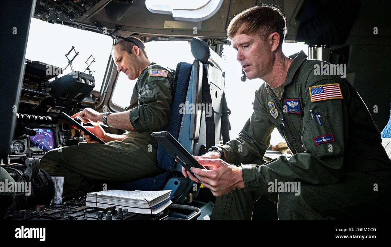 U.S. Air Force Major Robert Riggs (left) and Lt. Col. Scott Motley ...