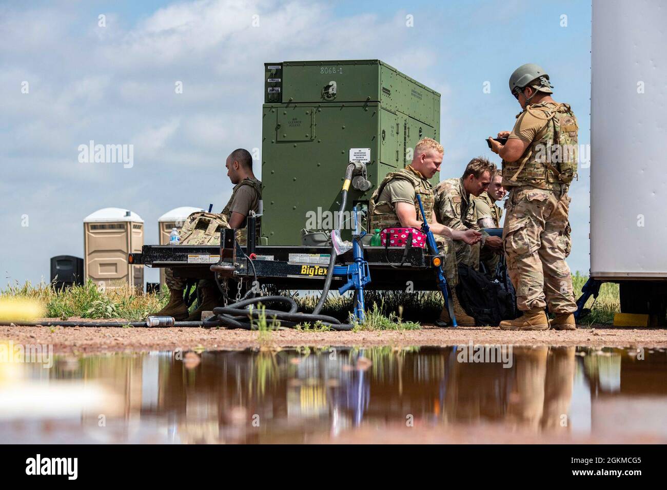 U.S. Air Force Airmen of the 97th Civil Engineer Squadron take a break ...