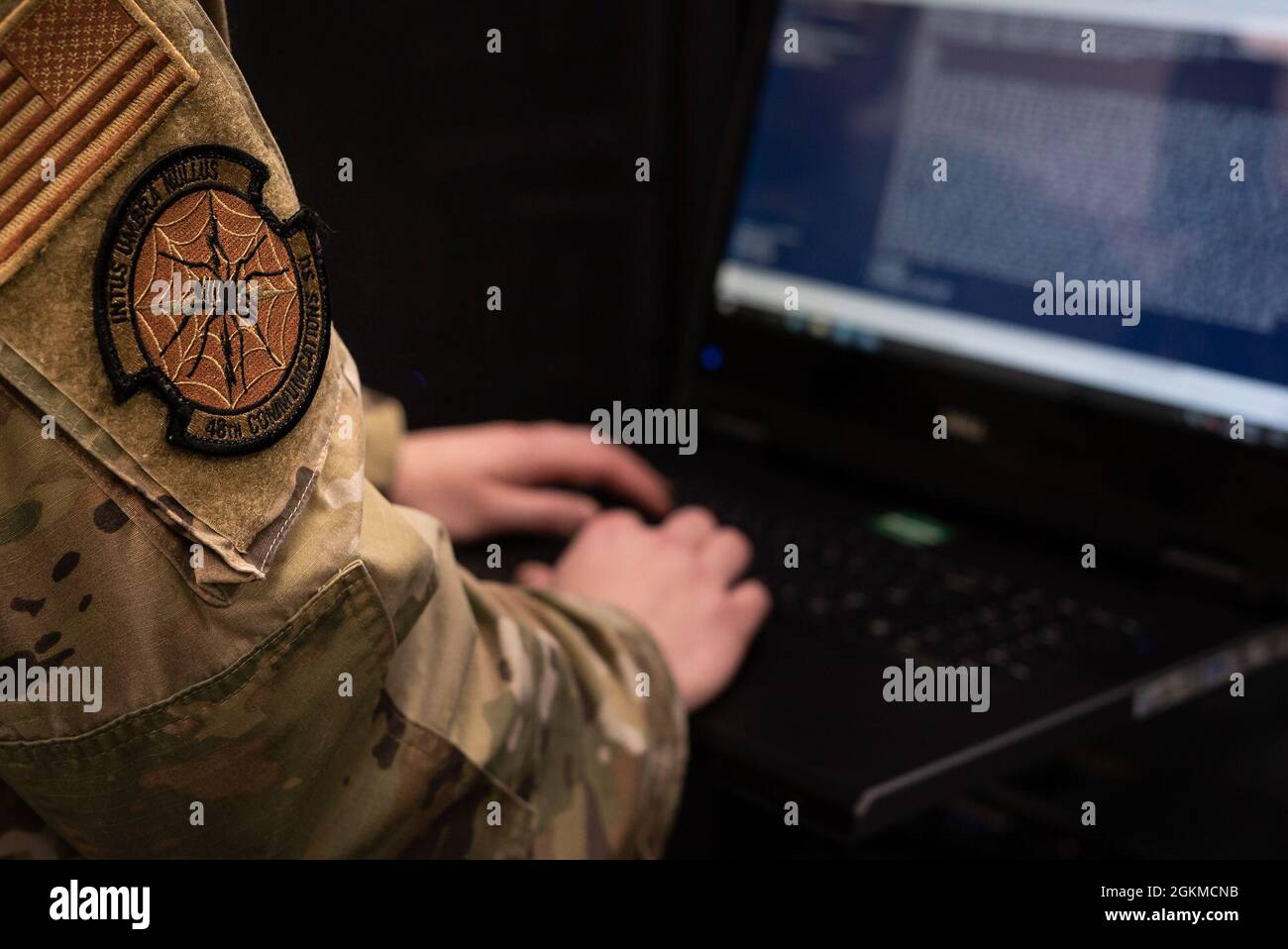 An Airman assigned to the 48th Communications Squadron works in the ...