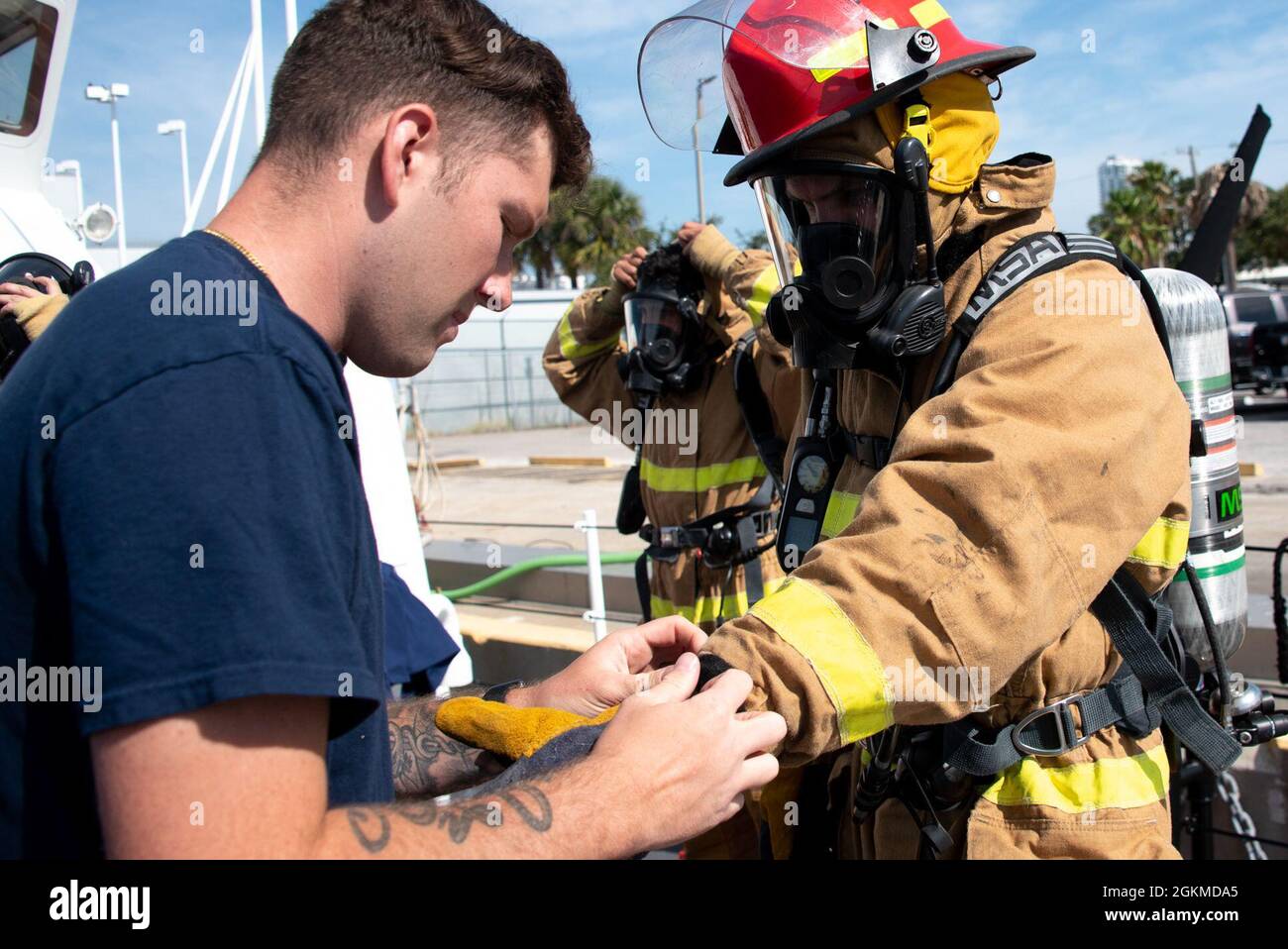 Coast Guard Cutter Brant crew members take part in emergency fire ...