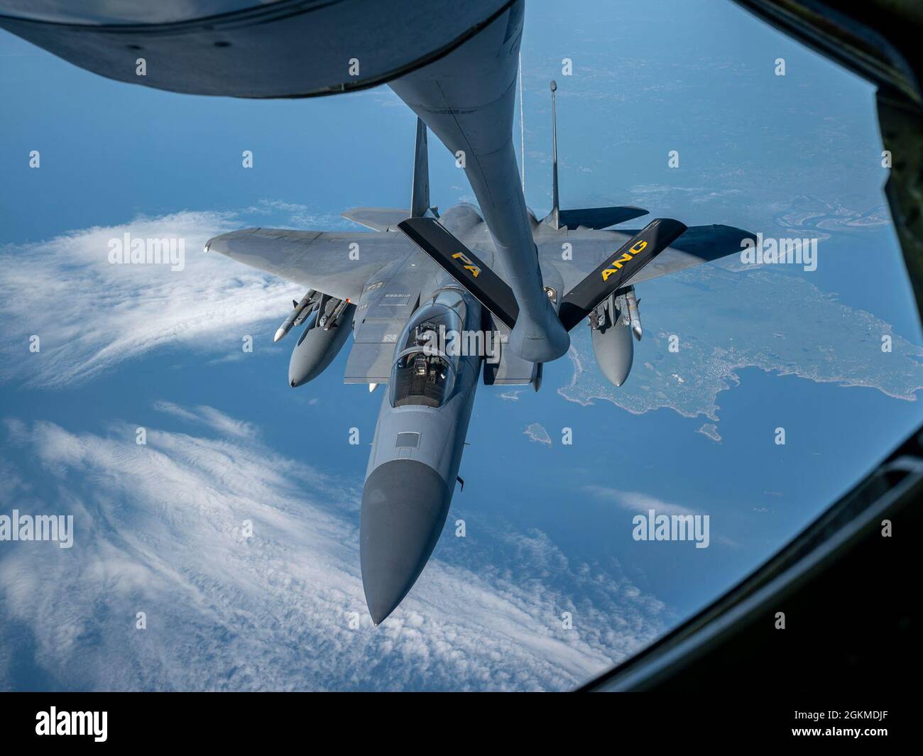 A U.S. Air Force F-15 Eagle fighter jet receives fuel from a KC-135 ...