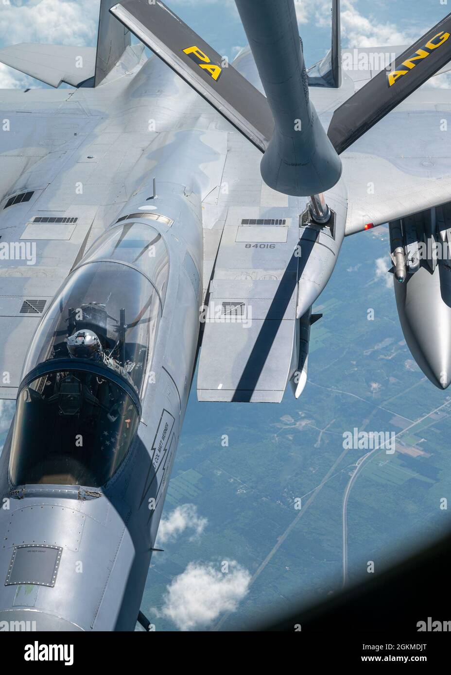 A U.S. Air Force F-15 Eagle fighter jet receives fuel from a KC-135 ...