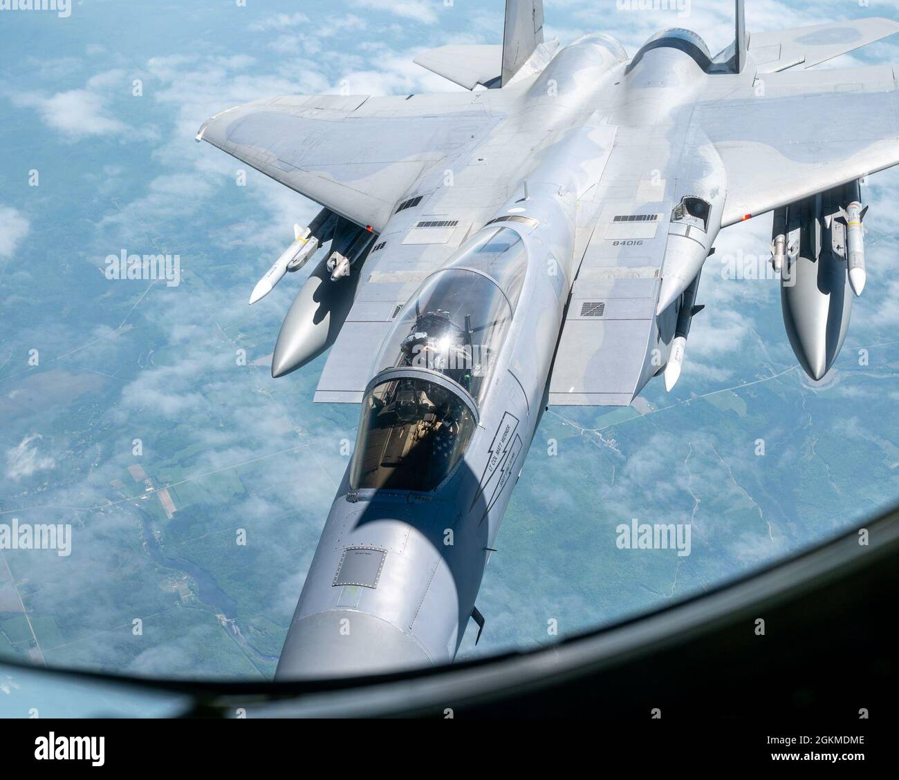 A U.S. Air Force F-15 Eagle fighter jet receives fuel from a KC-135 ...