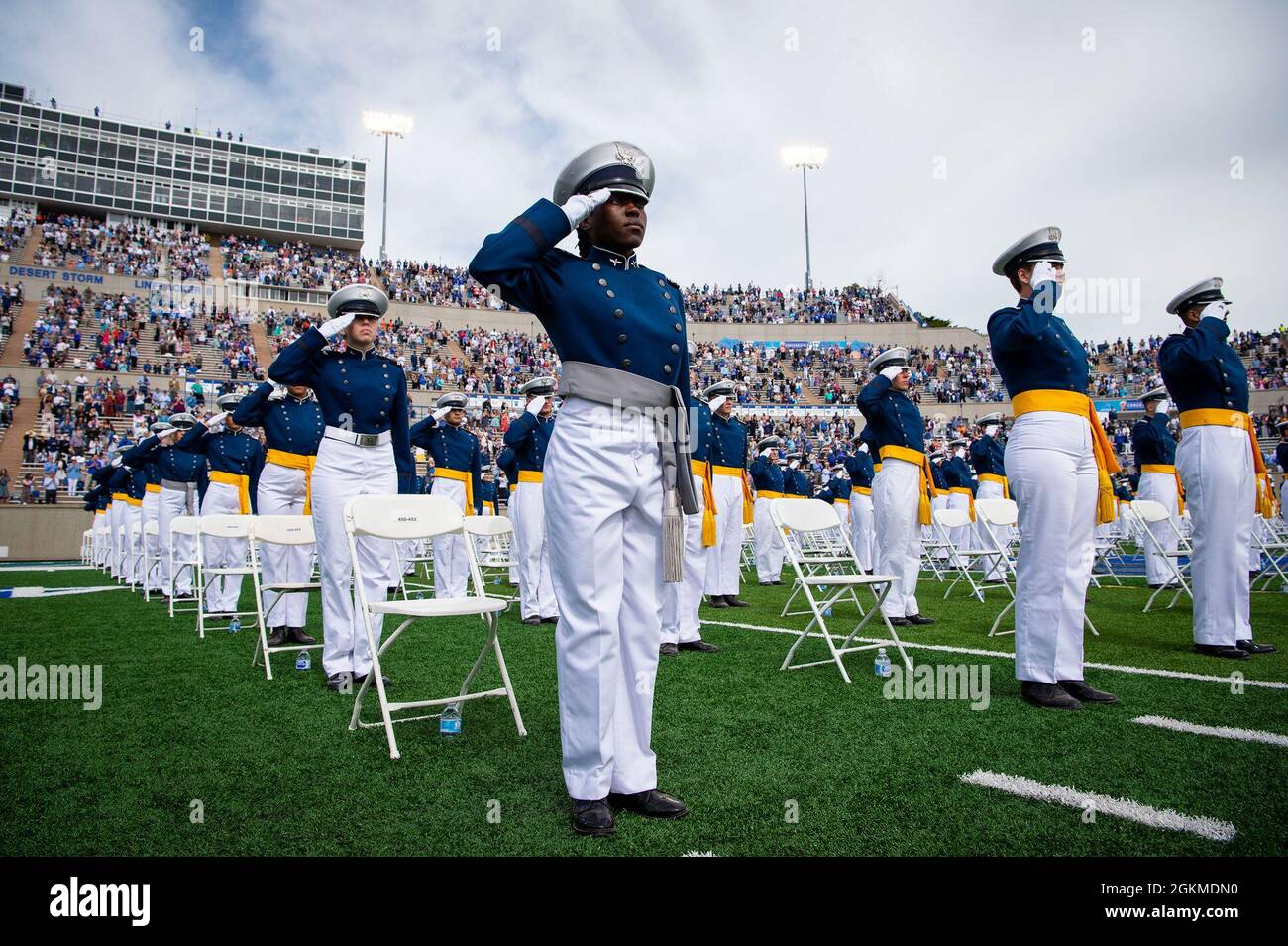 U.S. Air Force Academy -- Cadets salute for the national anthem played ...