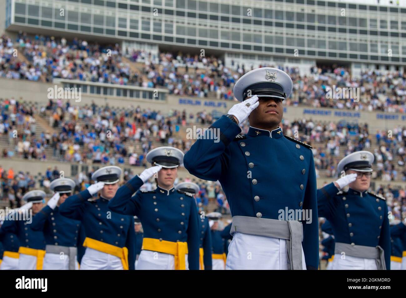 U.S. Air Force Academy -- Cadets salute for the national anthem played ...
