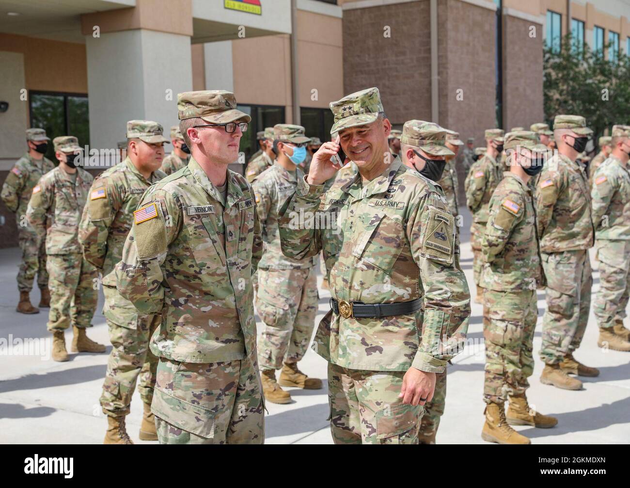 Maj. Gen. Sean Bernabe, senior commander, 1st Armored Division talks to ...
