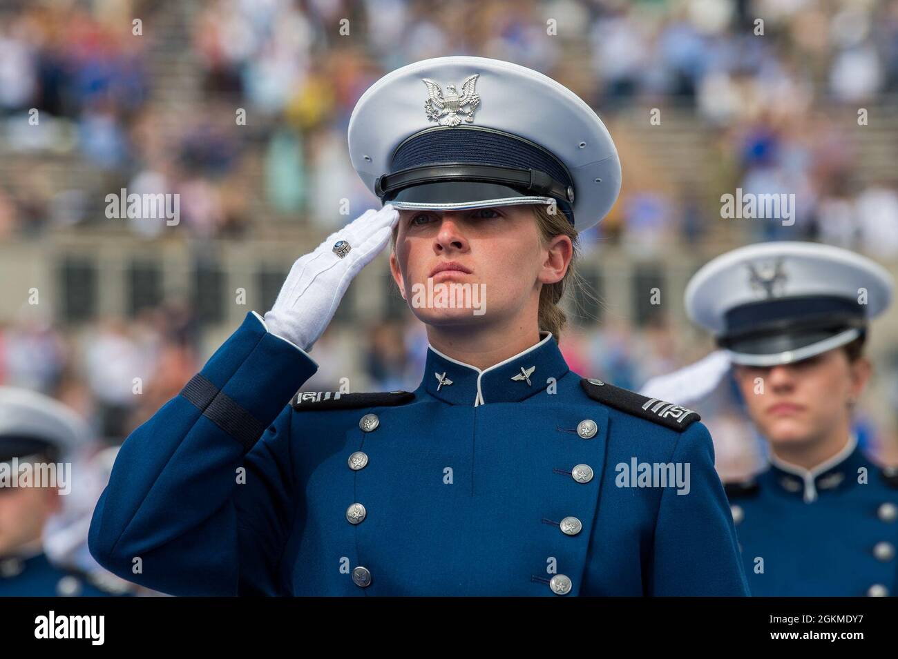U.S. Air Force Academy -- Cadets salute for the national anthem played ...